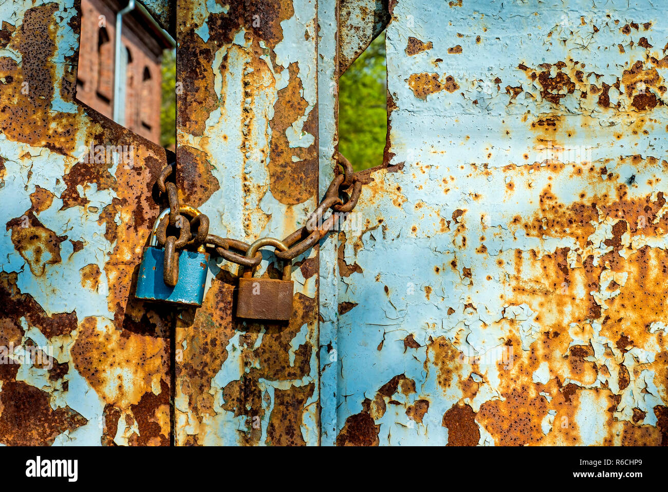 Rusty Gate With Locks Stock Photo - Alamy