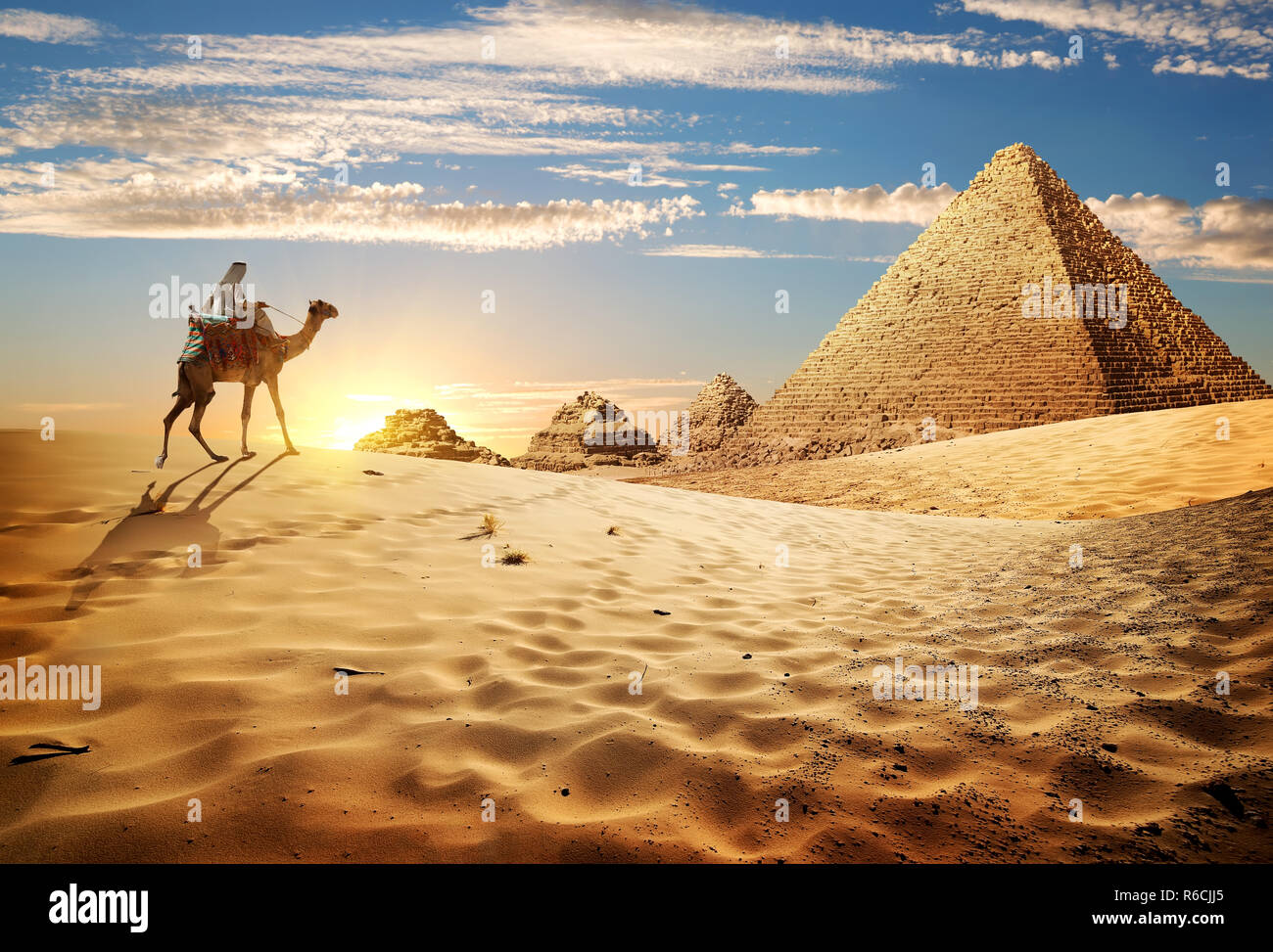Sunset in desert Stock Photo - Alamy