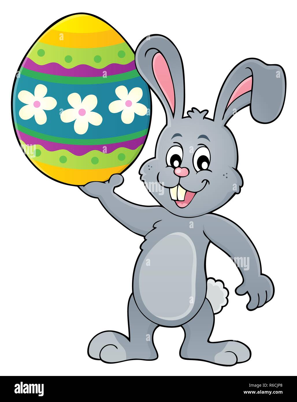 Bunny holding big Easter egg topic 1 Stock Photo - Alamy