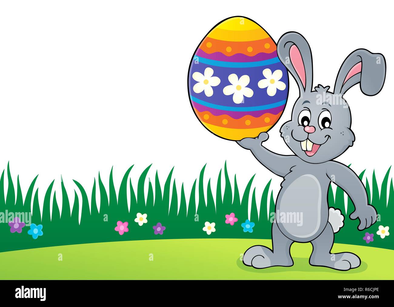 Bunny holding big Easter egg topic 3 Stock Photo - Alamy