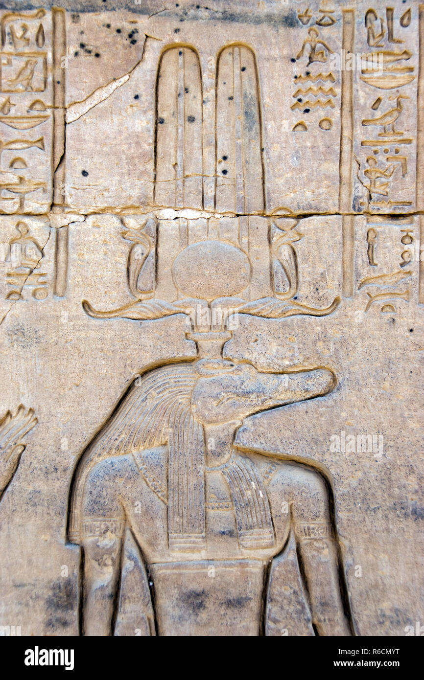 Bas relief images of the Egyptian god, Sobek, represented as a human ...