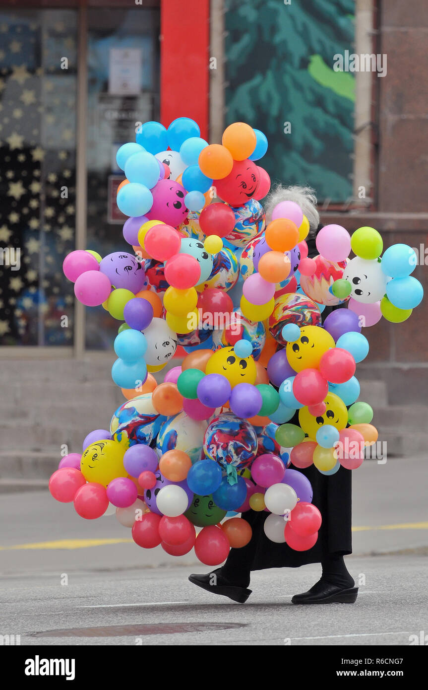 Russia, Moscow, Woman With Balloons Stock Photo - Alamy