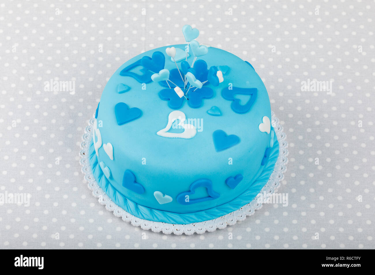 Modern blue round cake decorated hi-res stock photography and images ...