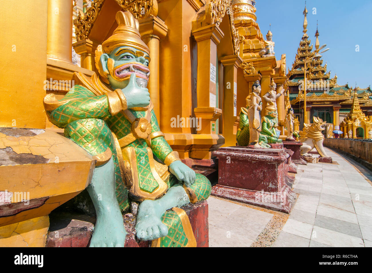 Mythological Demon Statue At Shwedagon Paya, The Most Sacred Golden ...