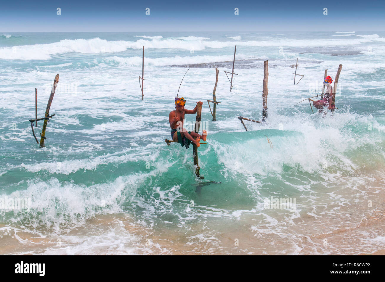 Stilt Fishing Is Fishing In Shallow Water On A Platform Made Up Of A ...