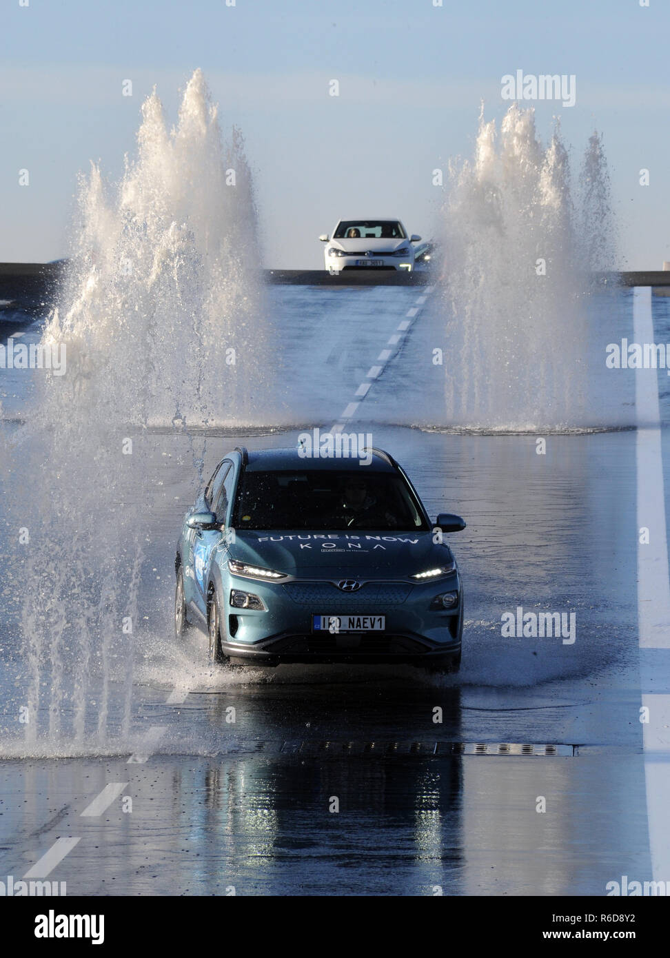 An electric car rides on a test circuit in the Autodrom Most within ...