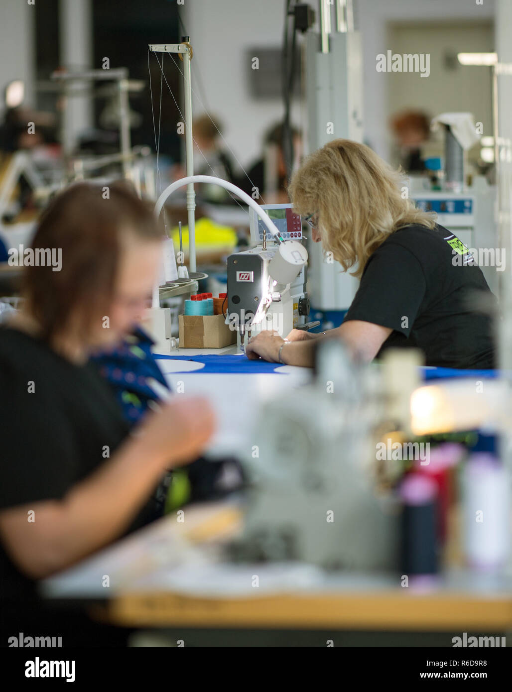 Bautzen, Germany. 05th Dec, 2018. Tailors work in the production of the ...
