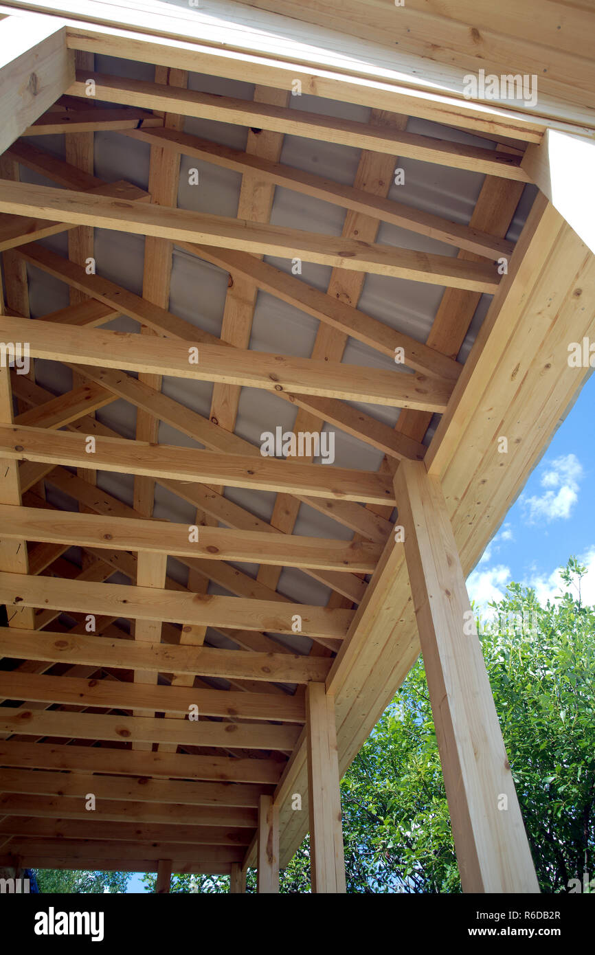 Ceiling carcass mounting inside house. Wooden country house ...