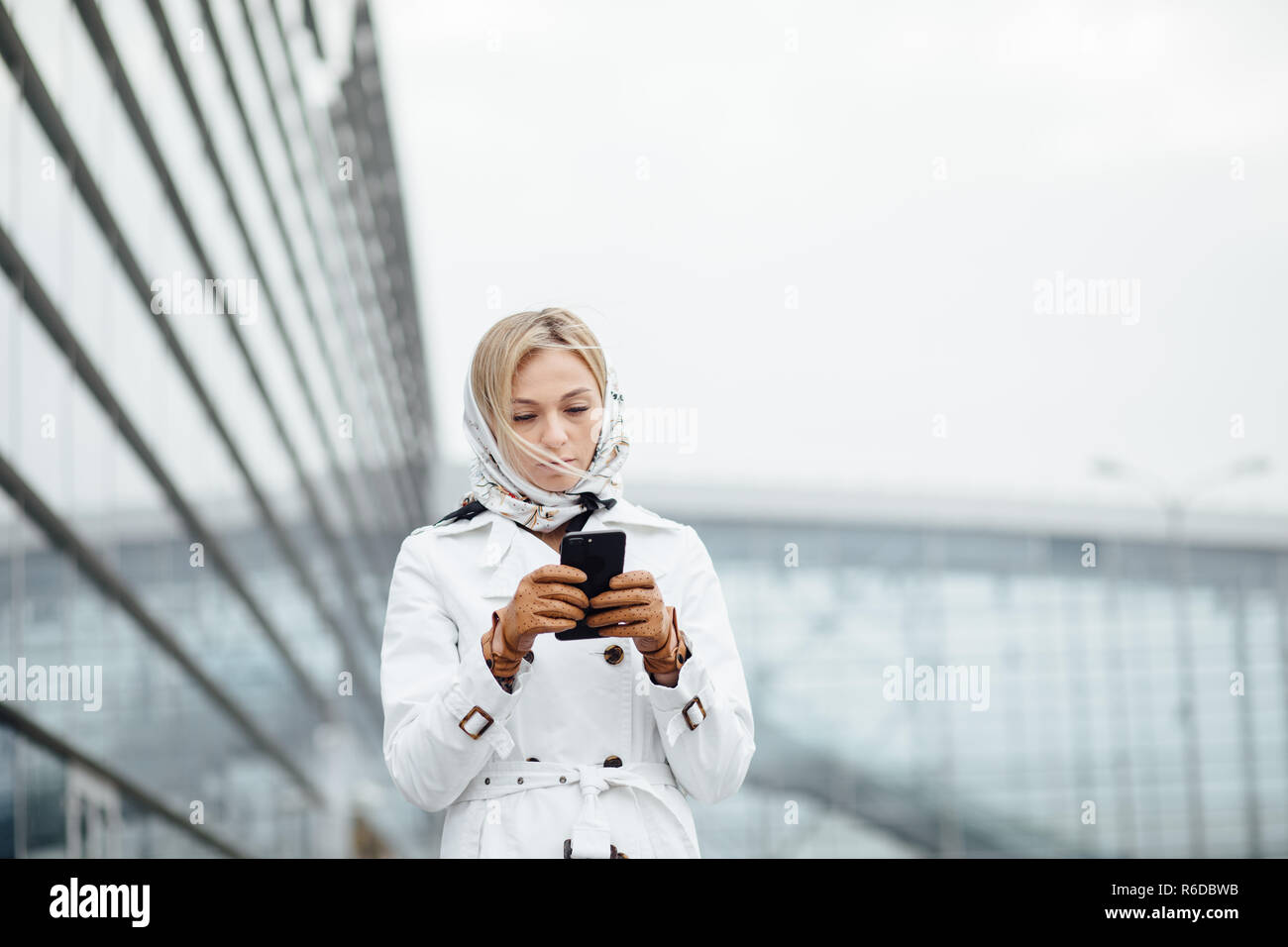 Close up view young woman in a big city using phone with copy s Stock ...