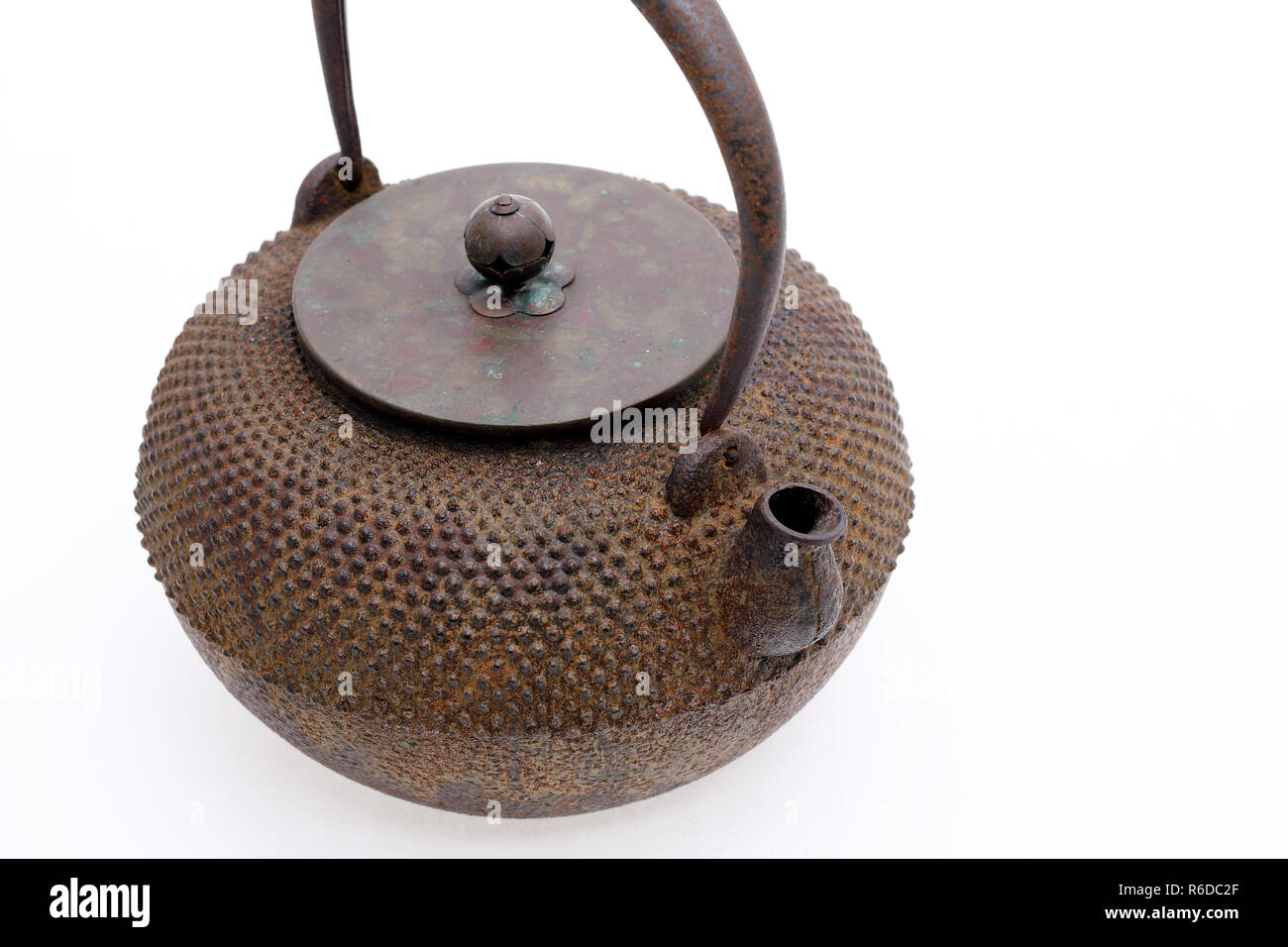 Traditional Japanese iron teapot on a white background Stock Photo - Alamy