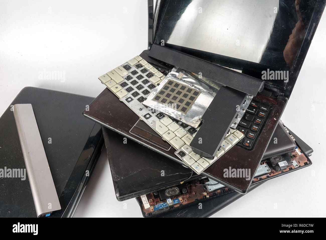 Obsolete laptops isolated on white Stock Photo - Alamy