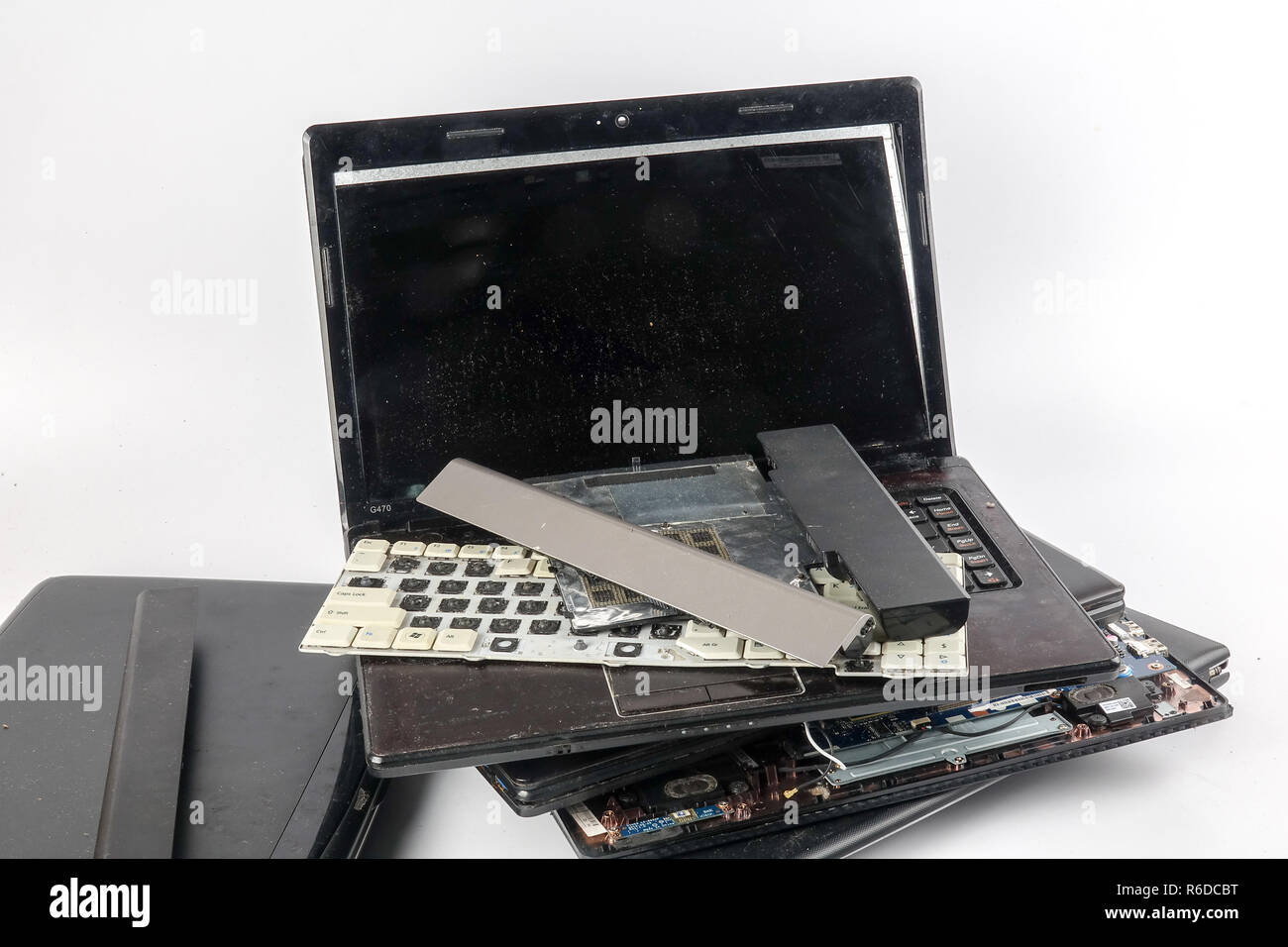 Obsolete laptops isolated on white Stock Photo - Alamy