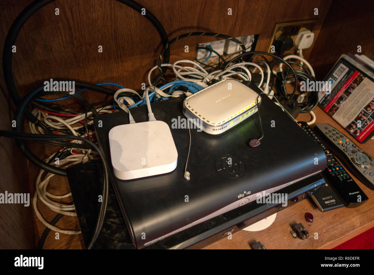 Jumbled wires behind TV control units in a mess at a home in England ...