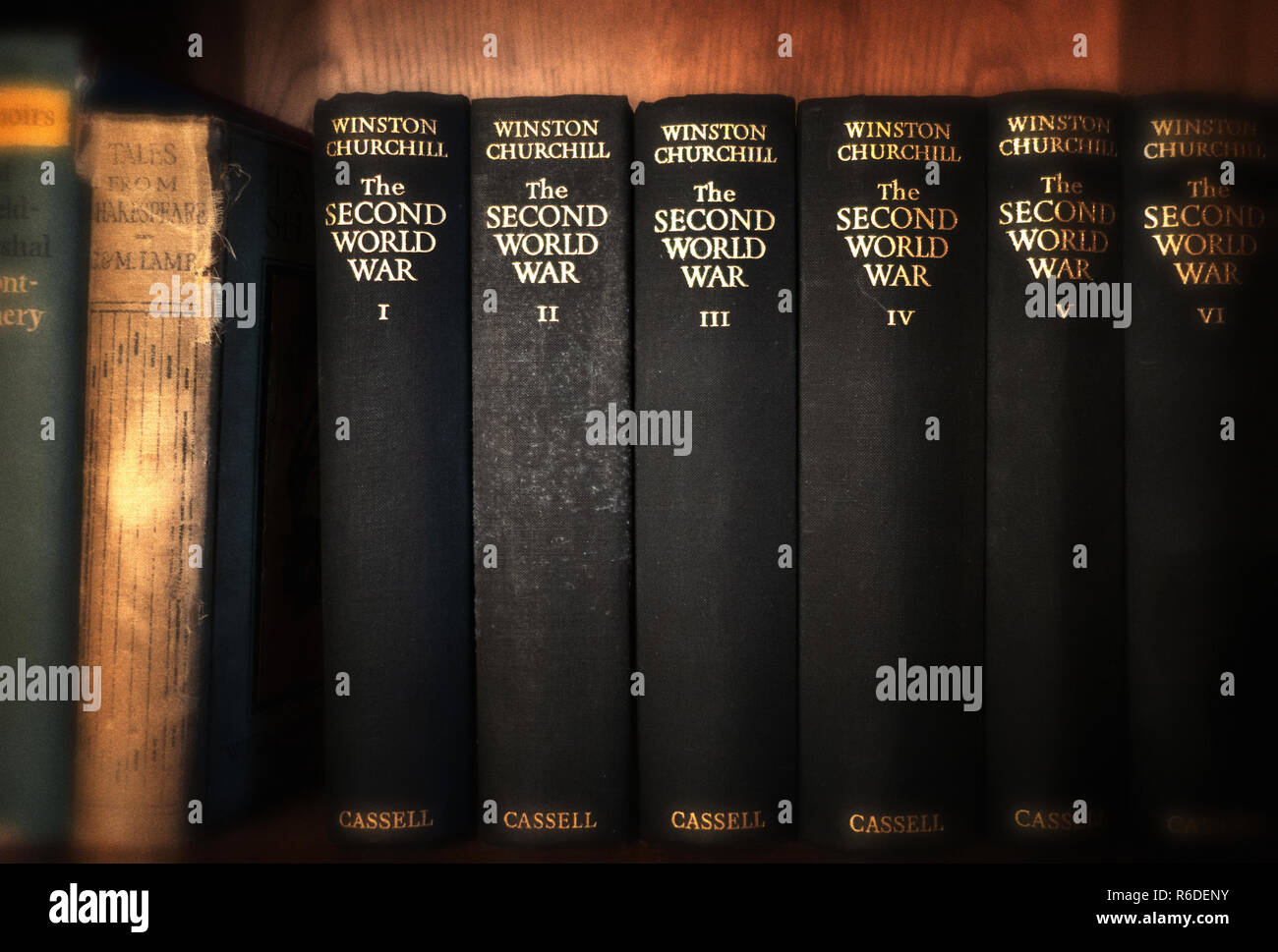 Old Volumes of Winston Churchill The second World war books on a book shelf in an English house ...