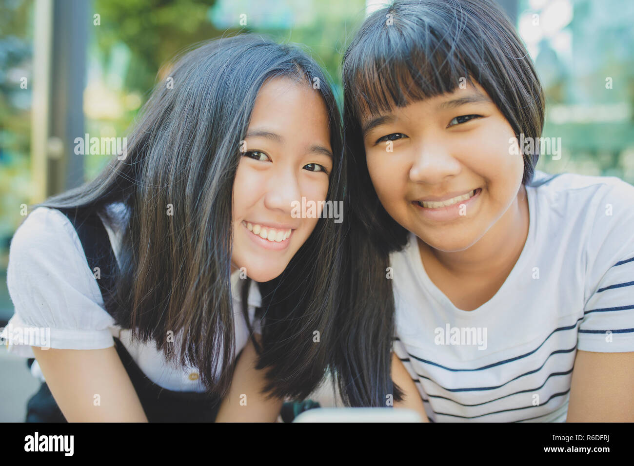 toothy smiling face of asian teenager happiness emotion Stock Photo - Alamy