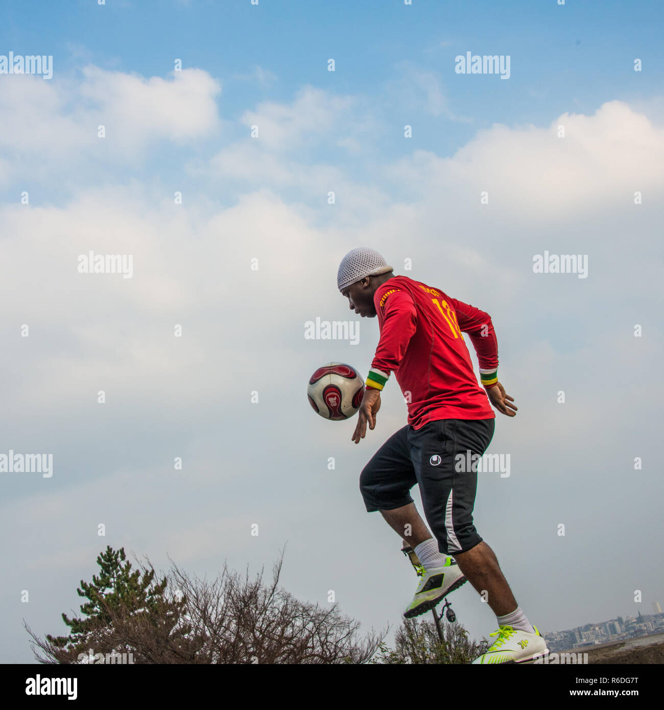 Football acrobatic in Paris Montmartre, jung man from Guinea Stock ...