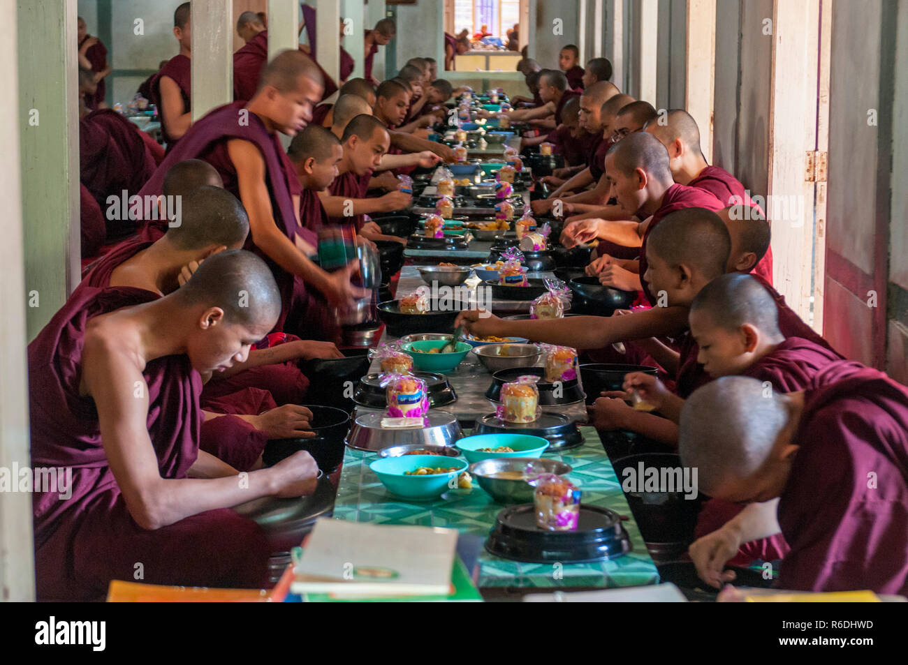 Buddhist Student Monks Eating Lunch In Their Dining Room At The ...