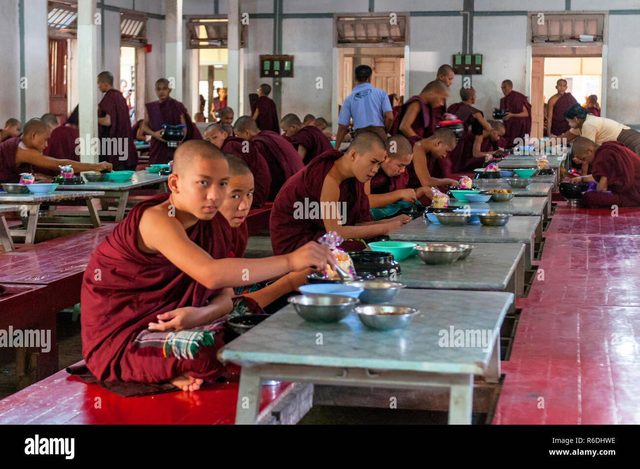 Buddhist Student Monks Eating Lunch In Their Dining Room At The ...
