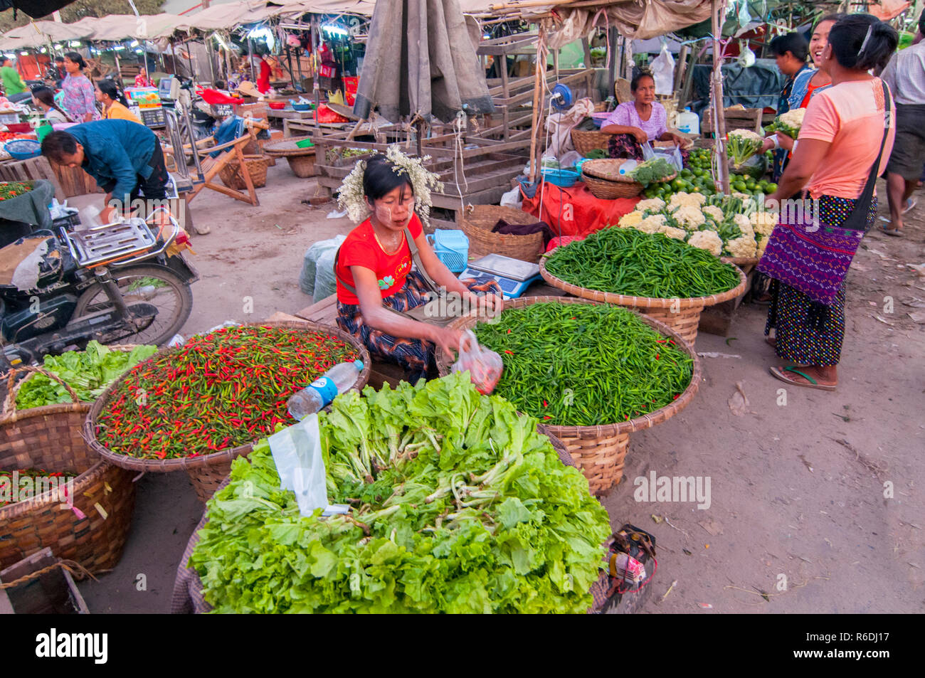 Burmese Women Selling At A Fresh Vegetable Market Stall Near Inle Lake ...