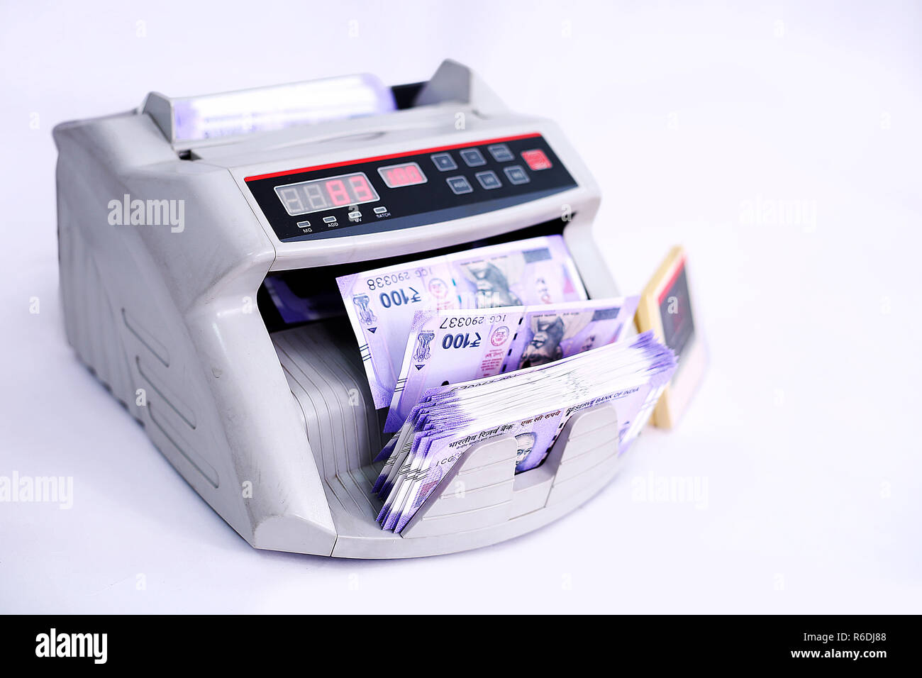 Machine for counting money with new currency. Isolated on the white ...
