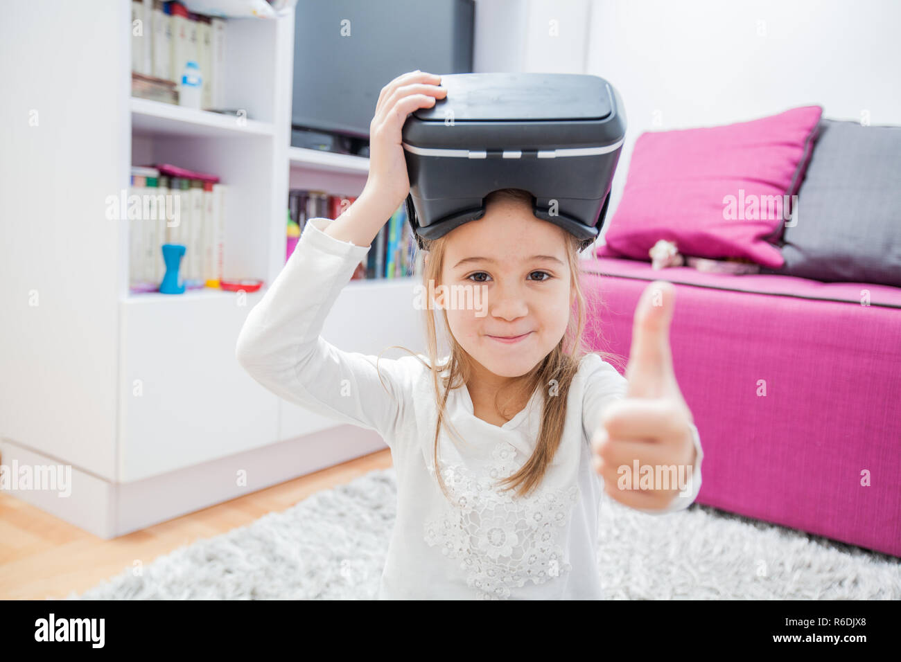 Child with Virtual Reality headset Stock Photo - Alamy
