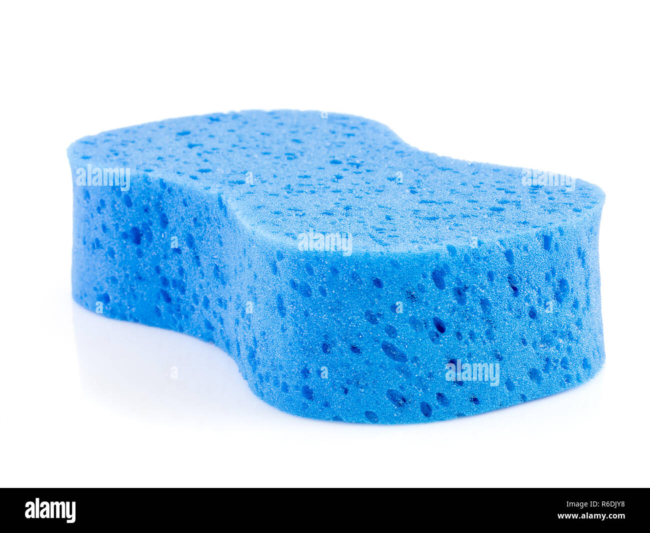 Blue sponge on white Stock Photo - Alamy