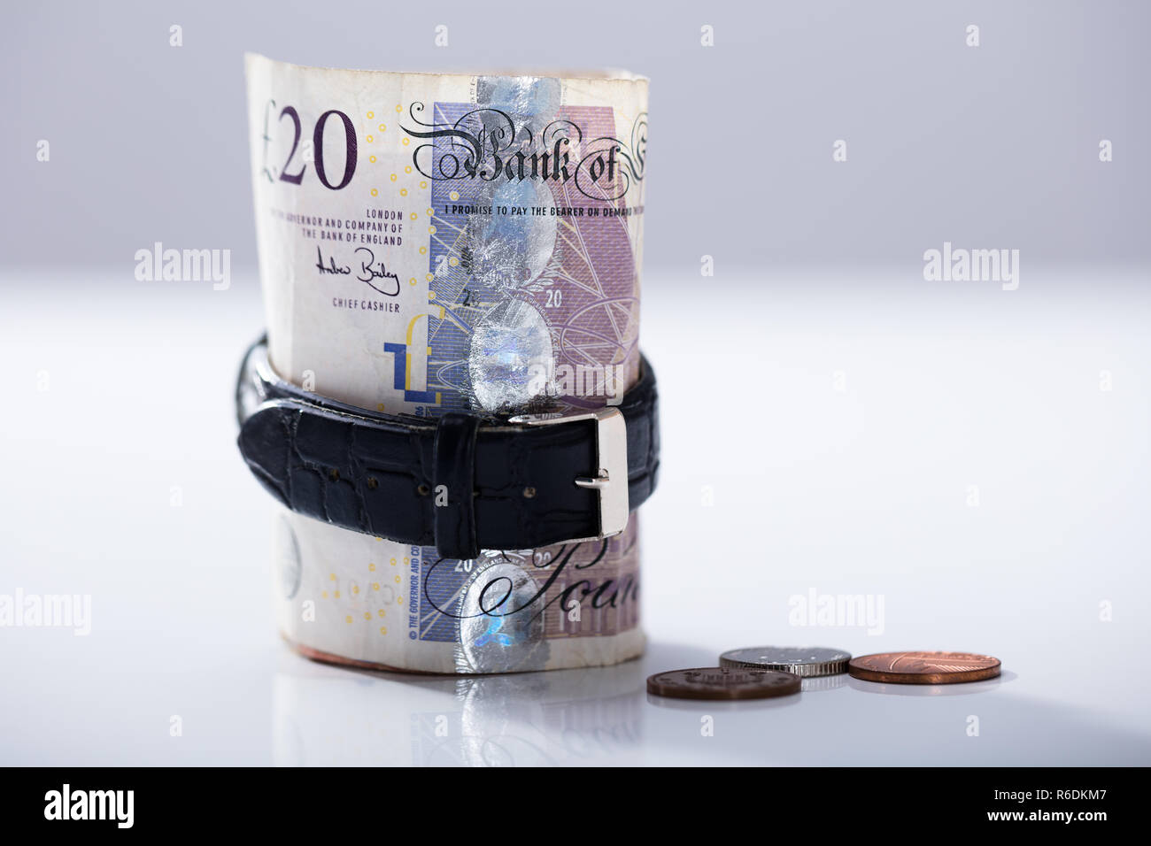 Rolled Up Twenty Pounds Currency Note Inside The Wrist Watch Stock ...