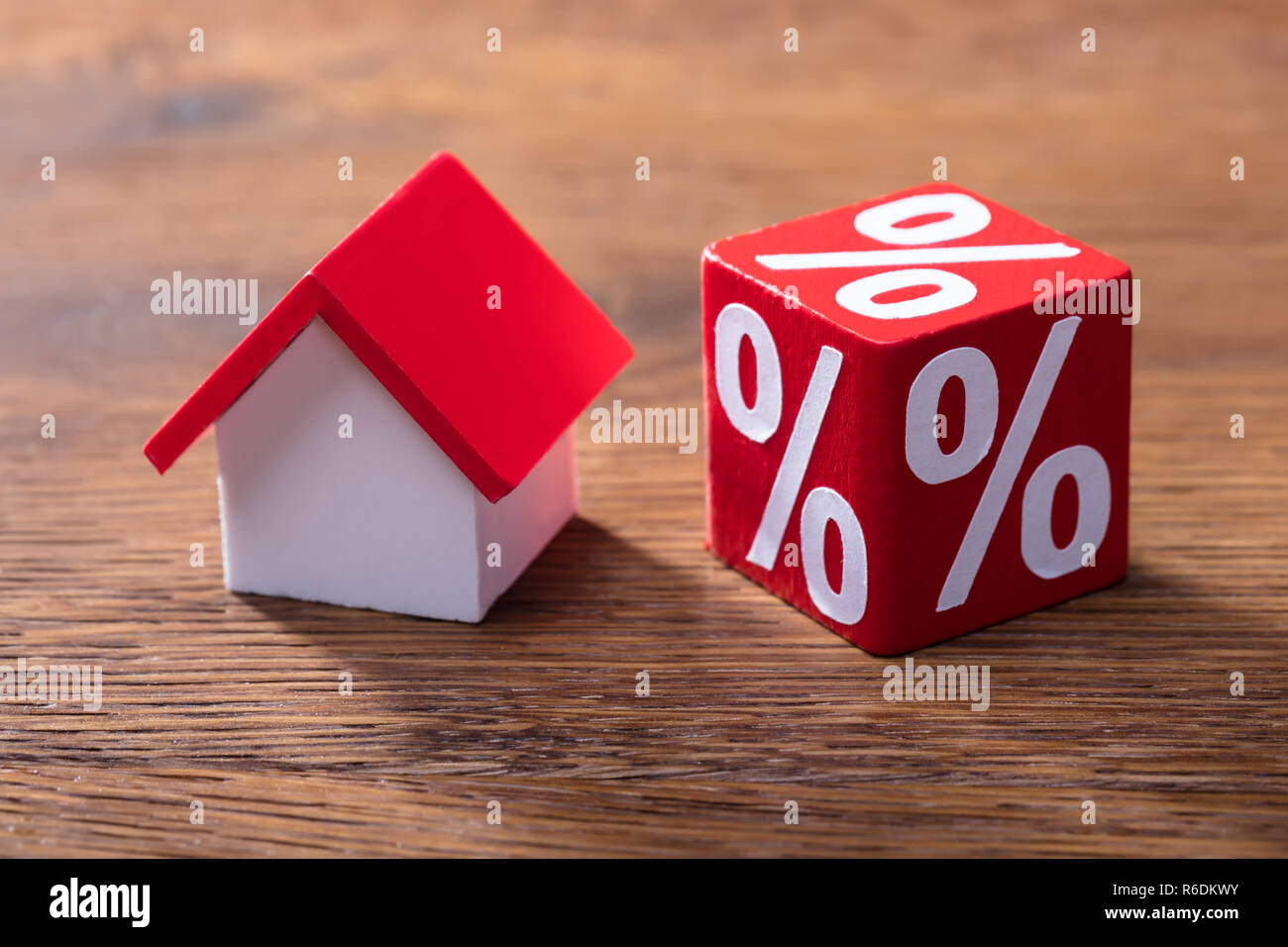 House Model And Percentage Red Block On Table Stock Photo - Alamy
