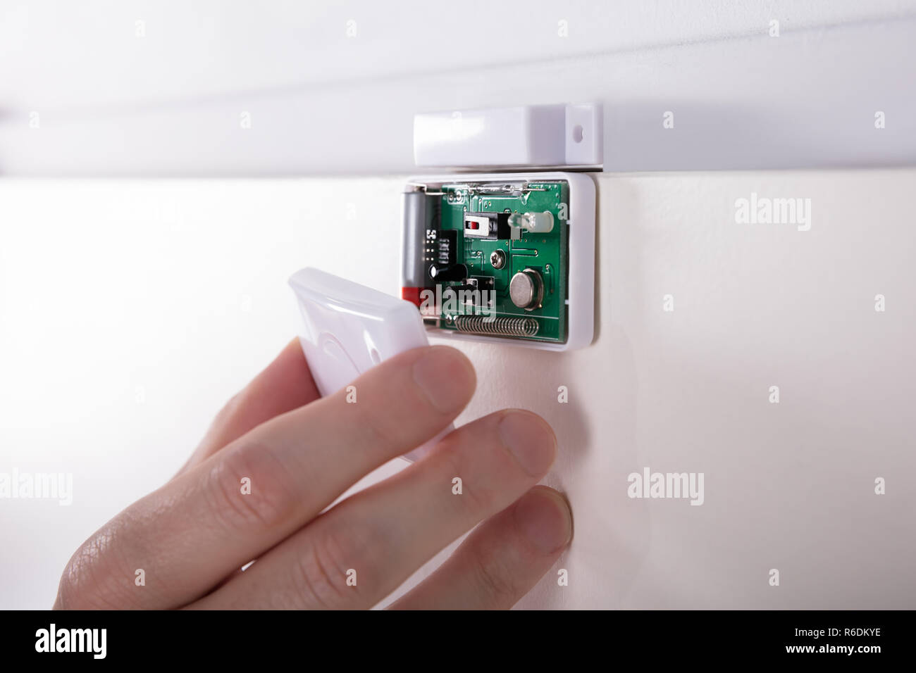 Human hand installing security hi-res stock photography and images - Alamy