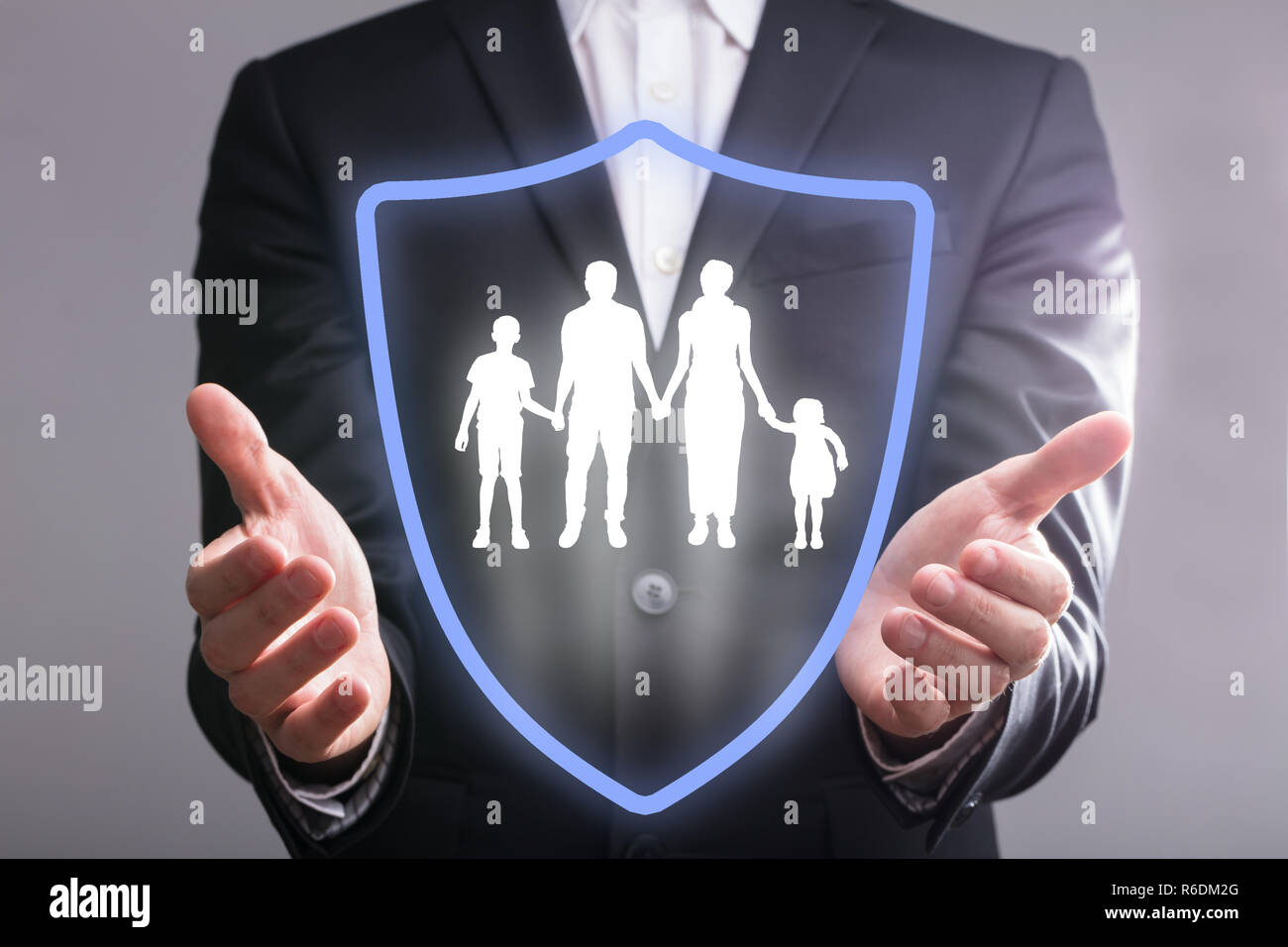 Hand with shield hi-res stock photography and images - Alamy