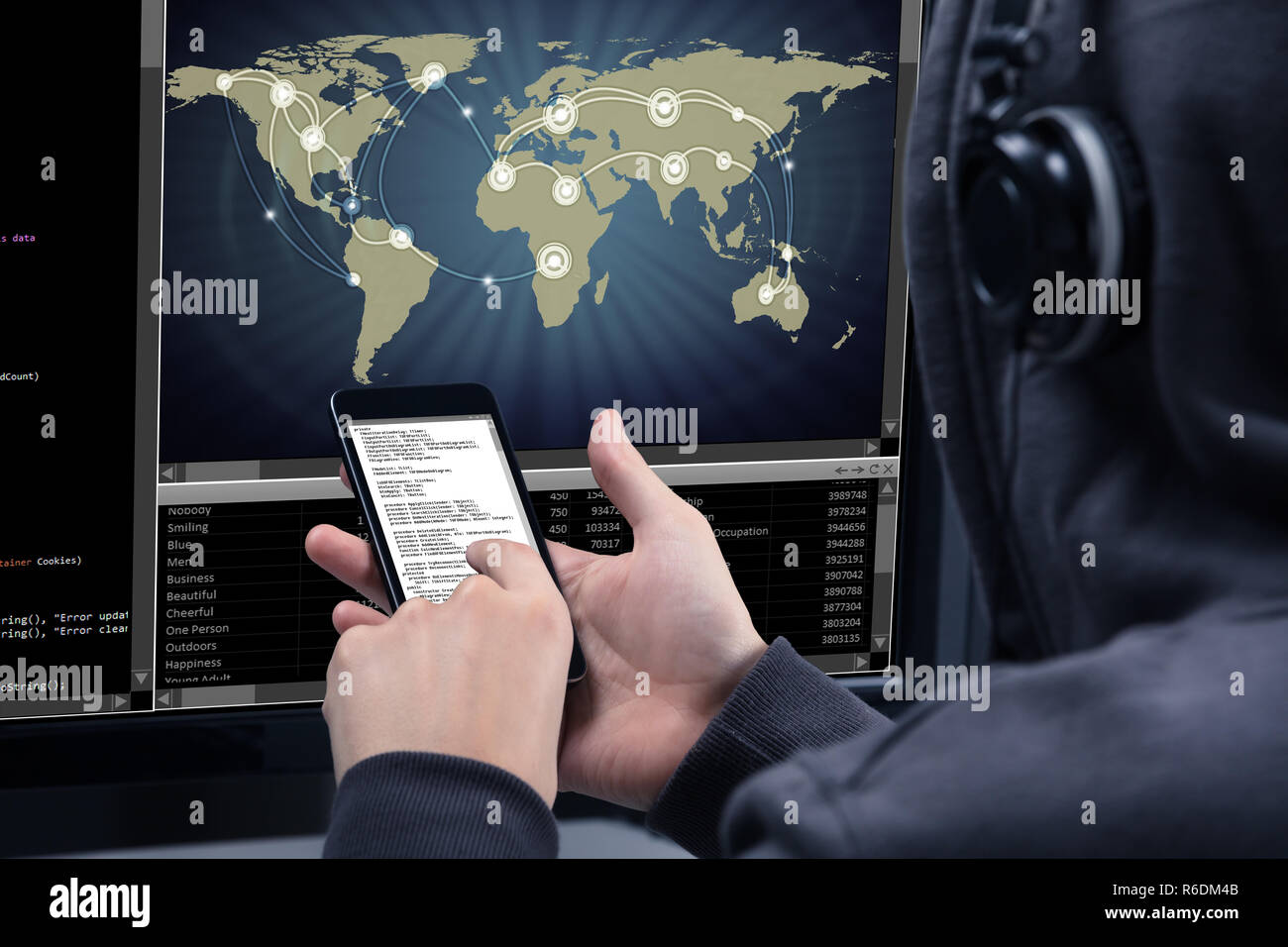 Hacker Using Mobile Phone For Stealing Data From Computer Stock Photo ...