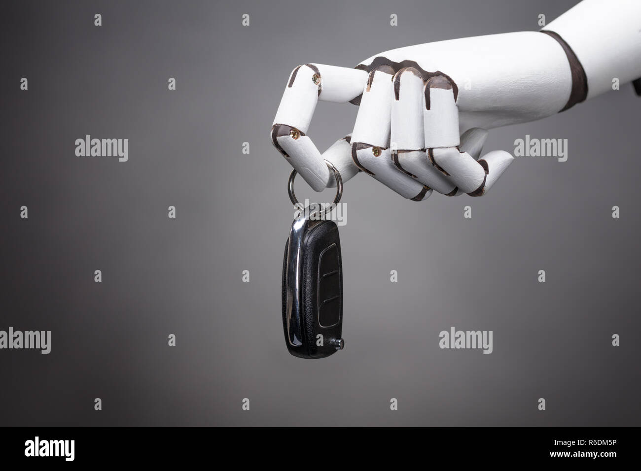 Robot Holding Car Key Stock Photo - Alamy