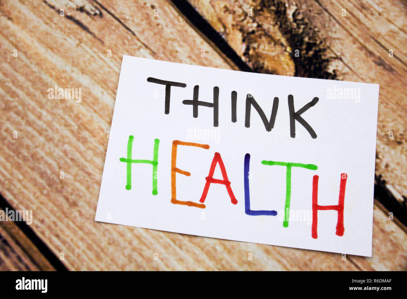 Memo note on Sticky note Think Health, think of your Helath Stock Photo ...