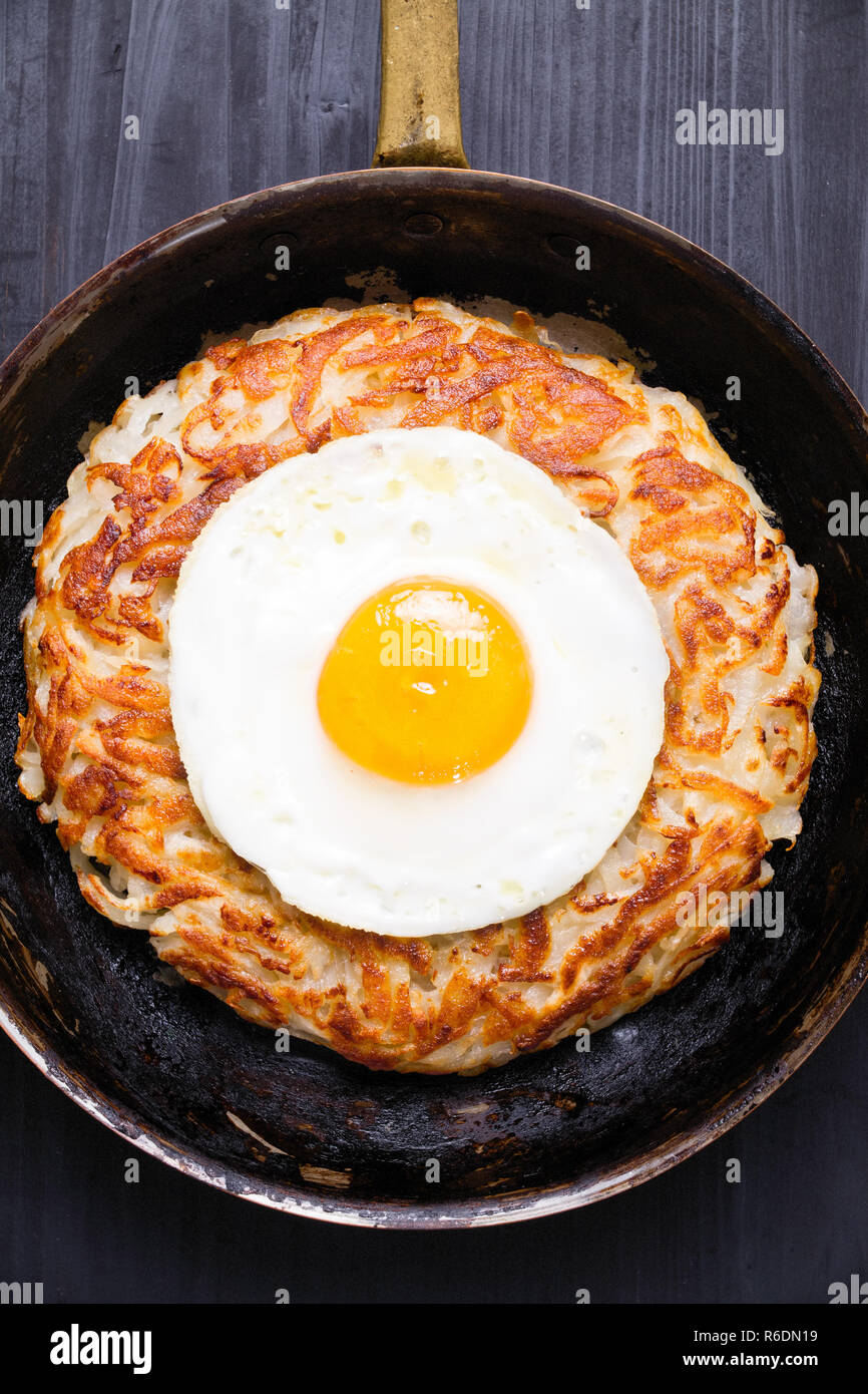 rustic golden swiss rosti potato Stock Photo - Alamy
