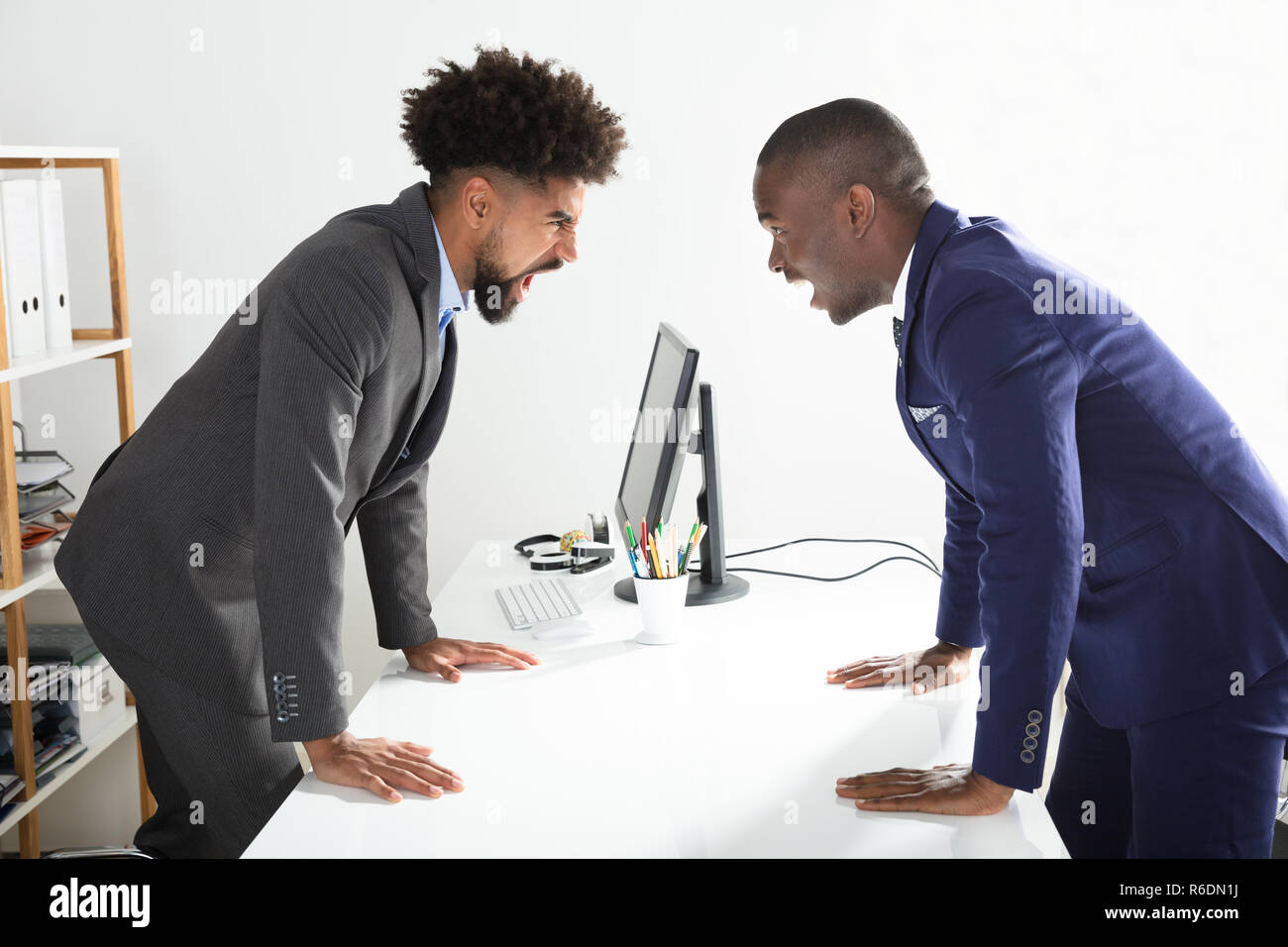 Two Businessmen Shouting At Each Other Stock Photo - Alamy