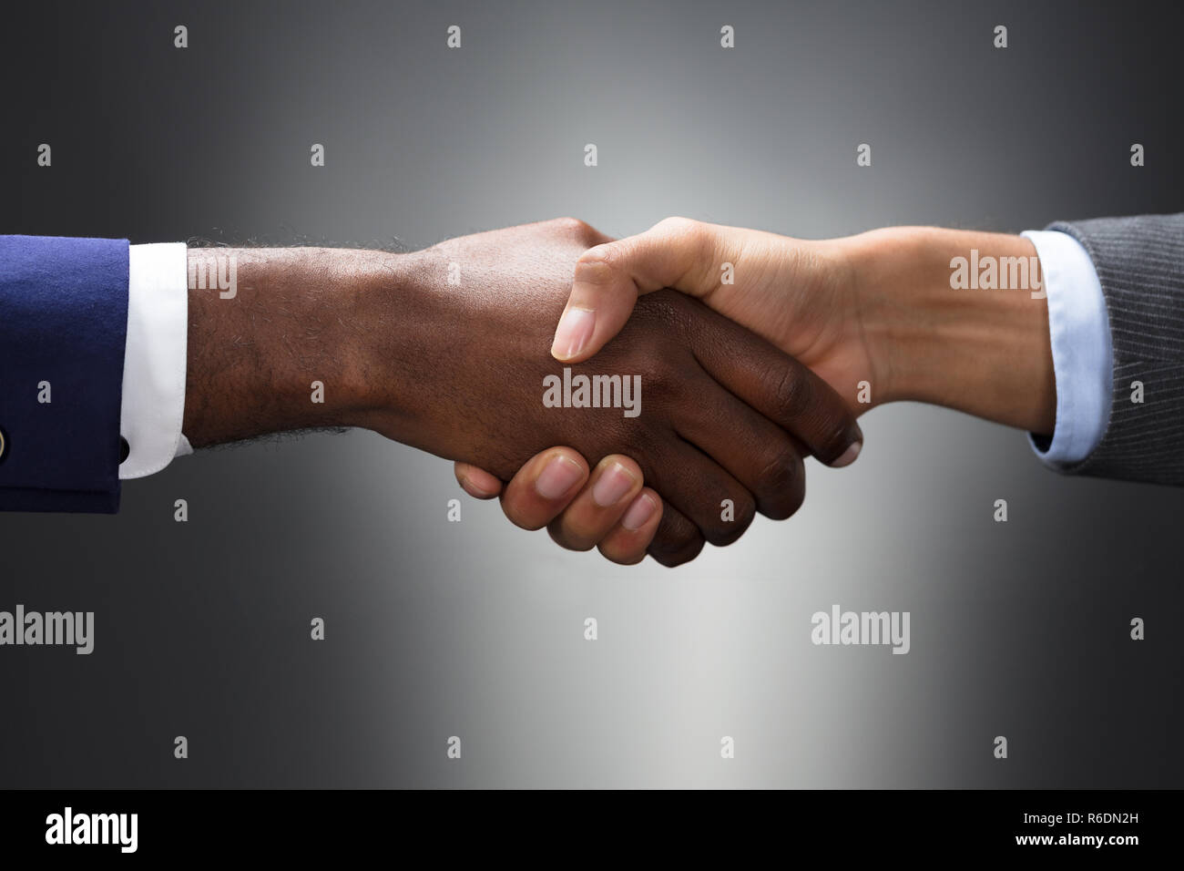 Multiethnic Hands Shaking Stock Photo - Alamy