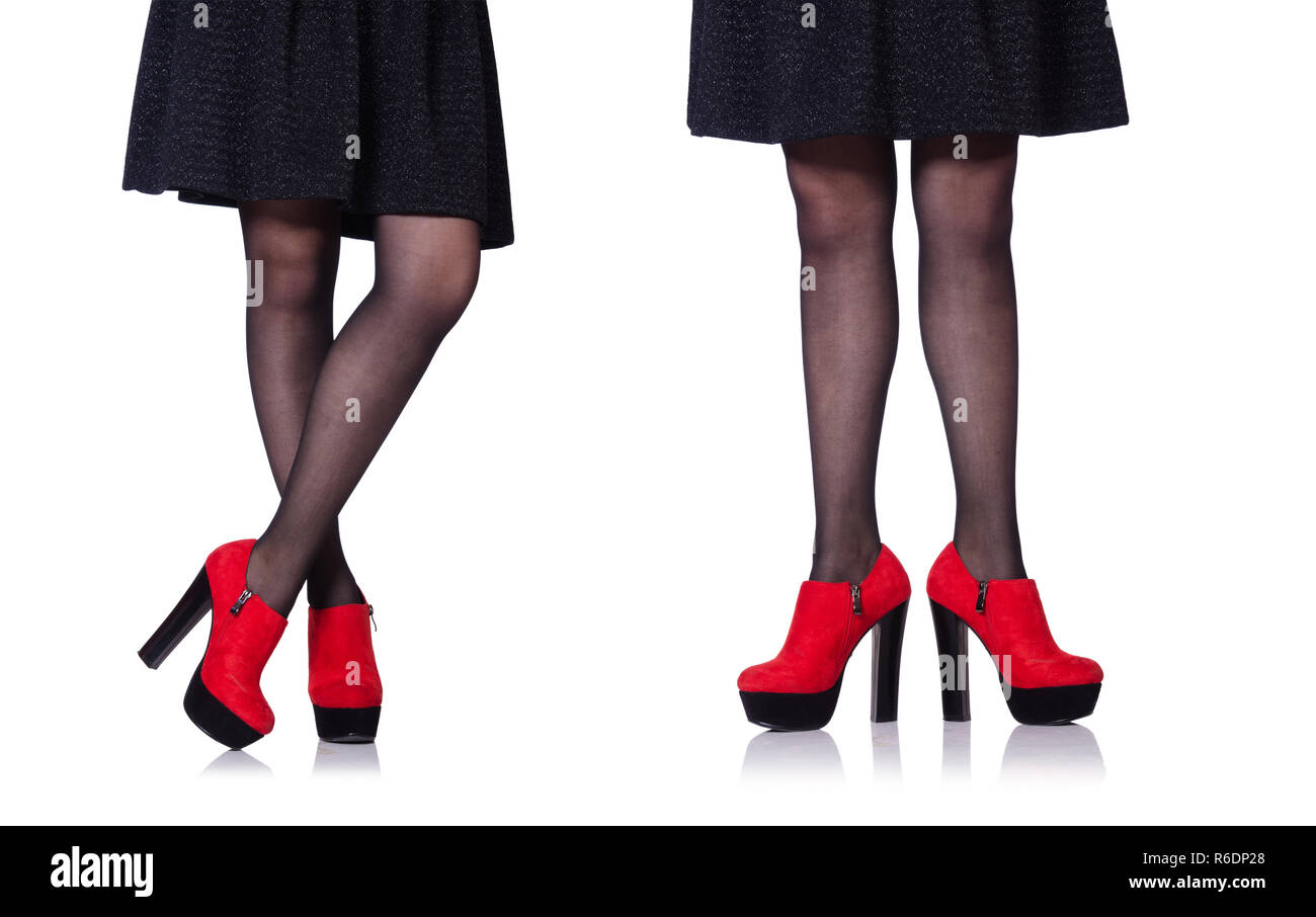 Woman legs with red shoes isolated on the white Stock Photo - Alamy