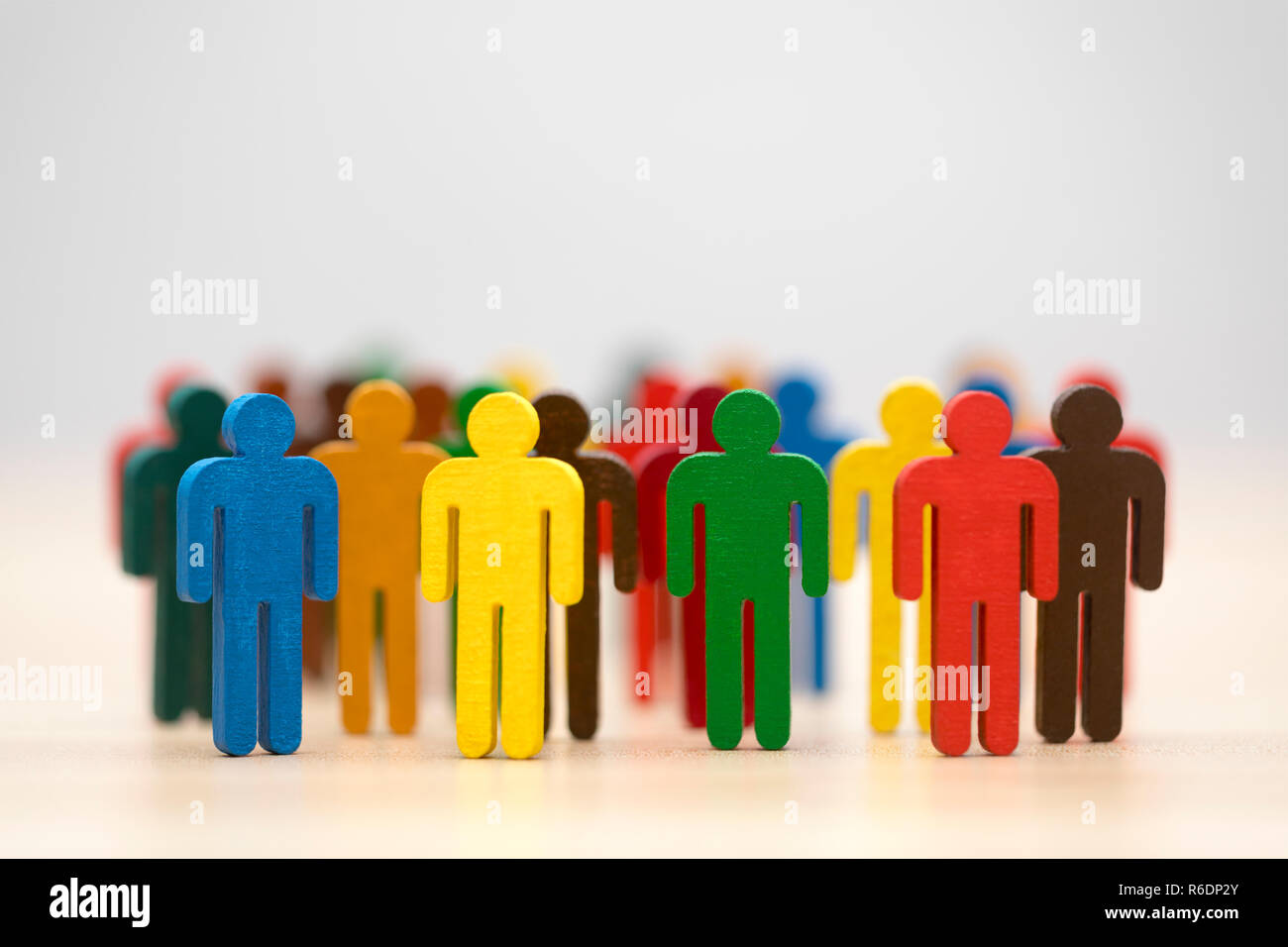 Colorful painted group of people figures Stock Photo - Alamy