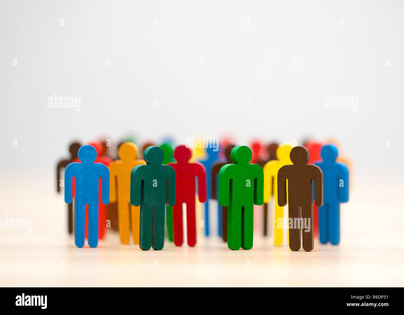 Colorful painted group of people figures Stock Photo - Alamy