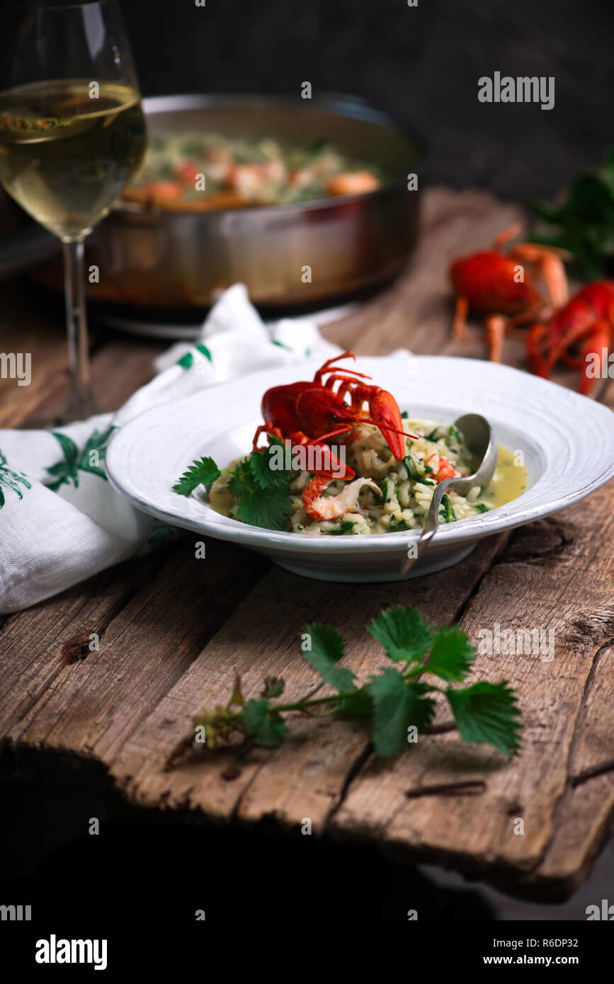 risotto with nettles and crayfish.style rustic.selective focus Stock ...
