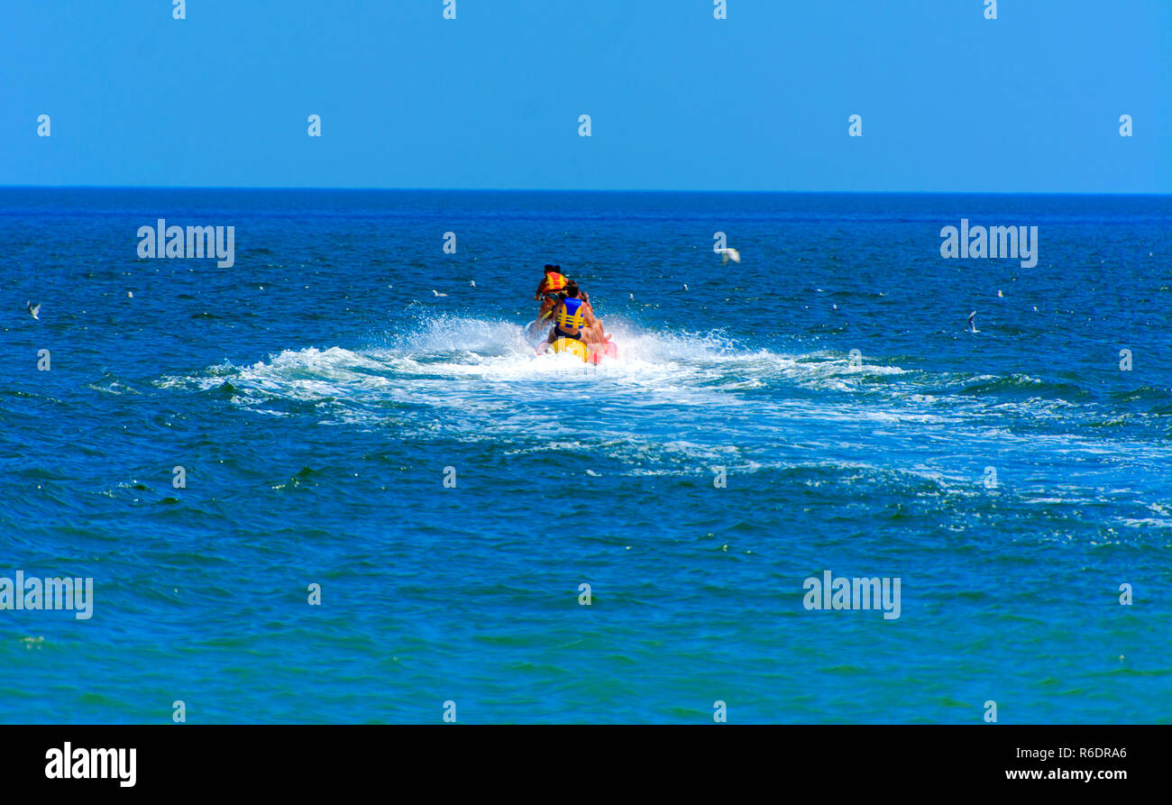 Odessa, Ukraine - August 8, 2018. Tourists having fun and enjoy riding ...