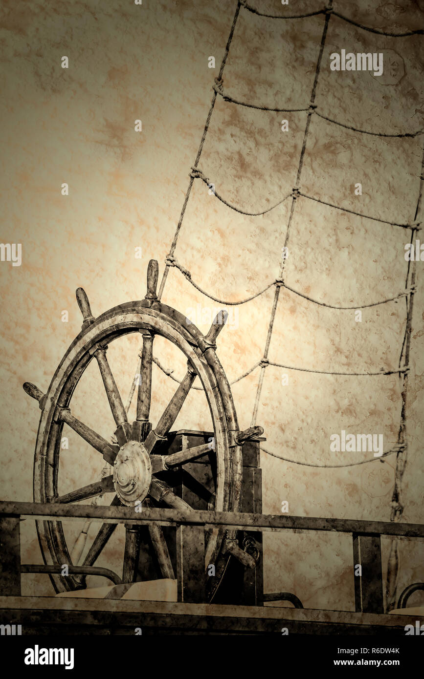 Wheel Of An Old Sailing Ship Stock Photo - Alamy