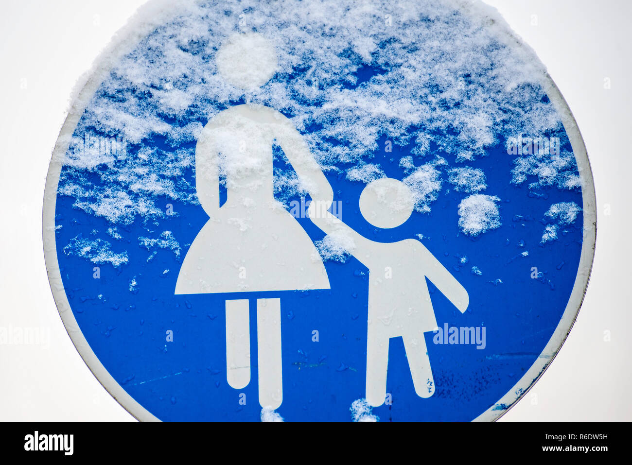 Snow On Traffic Sign Stock Photo - Alamy