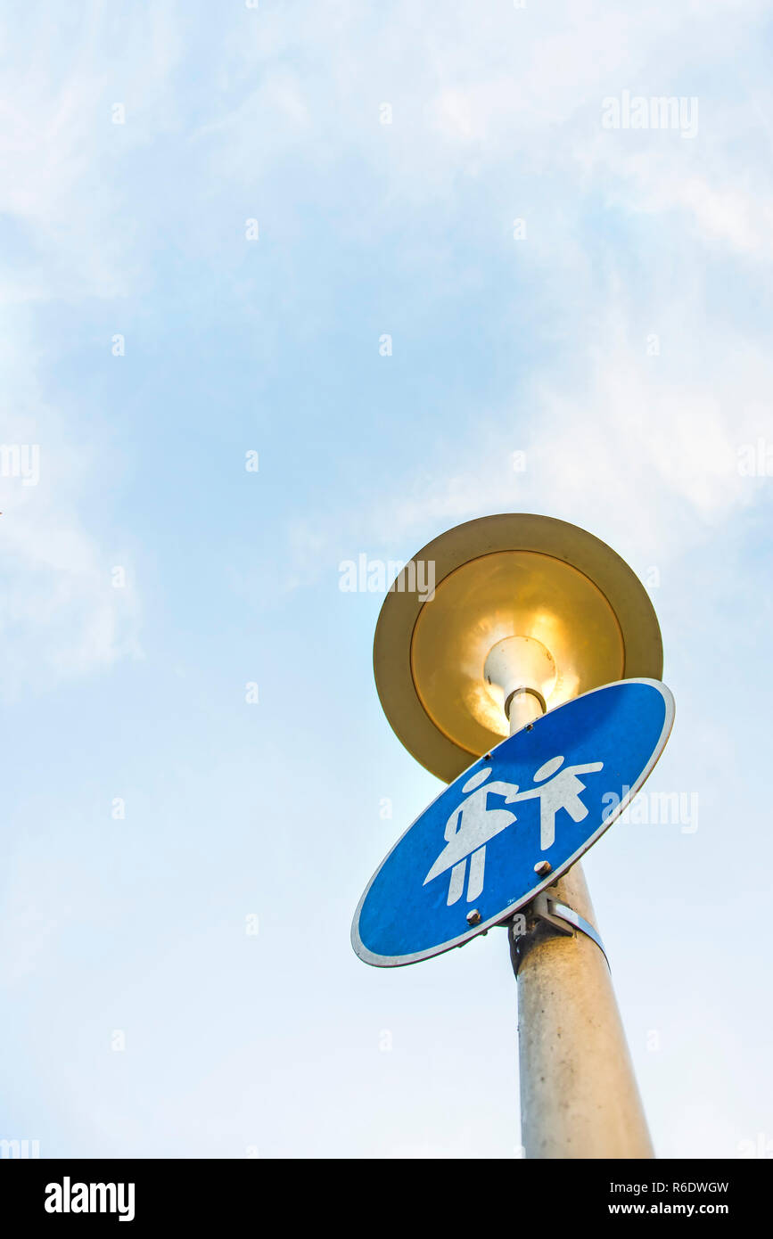Traffic Sign On Street Lantern Stock Photo - Alamy