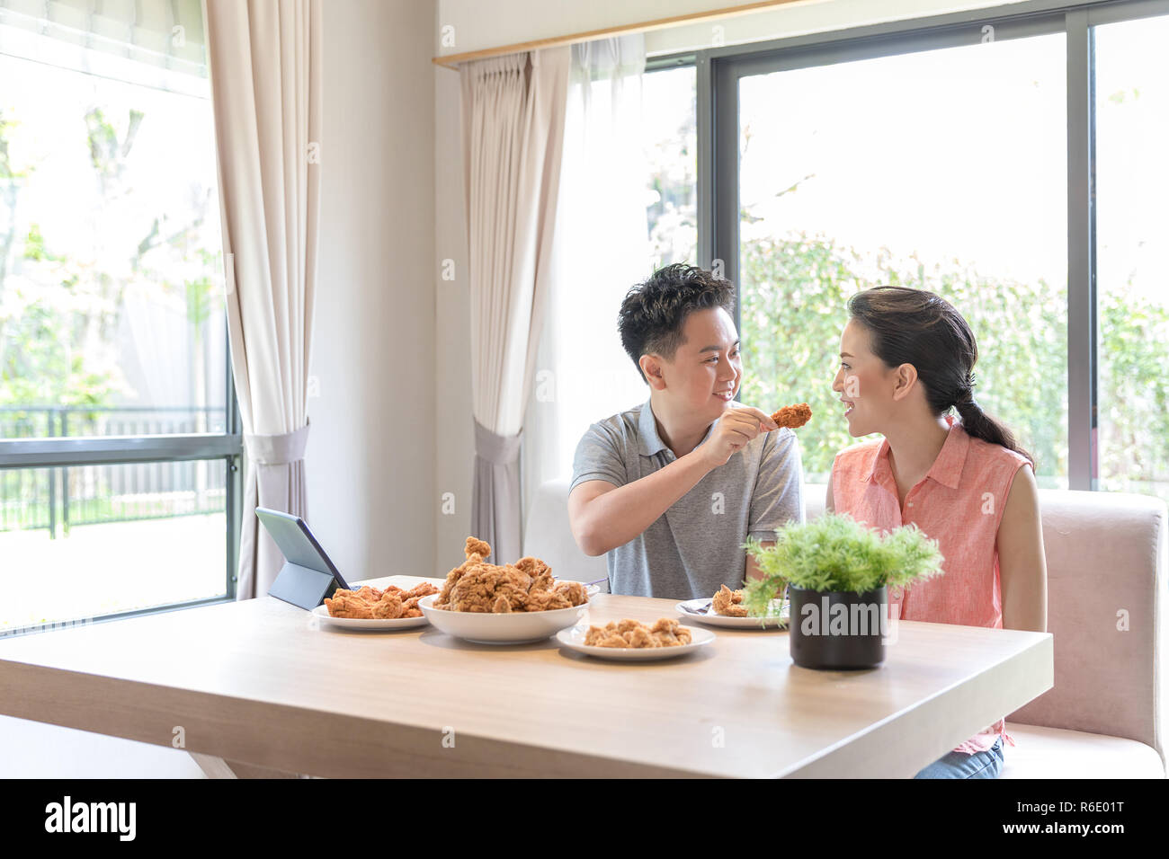 Couples eating together Stock Photo - Alamy