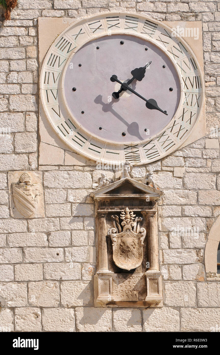 Croatia, Sibenik, Clock In Front Of Church Of St Barbara Stock Photo ...