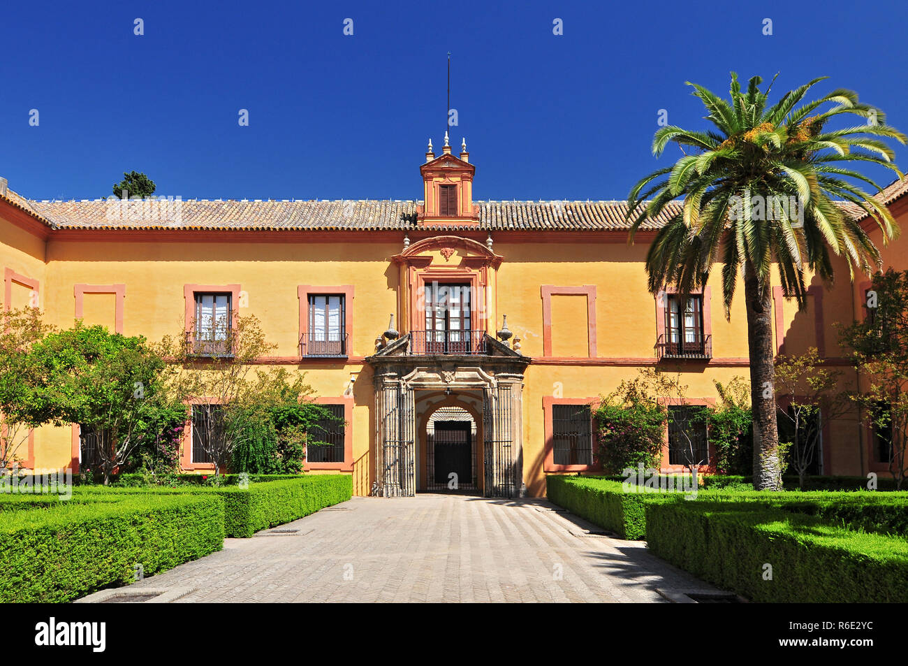 Palm Tree And Exterior View Of Building In The Alcazar Of Seville ...