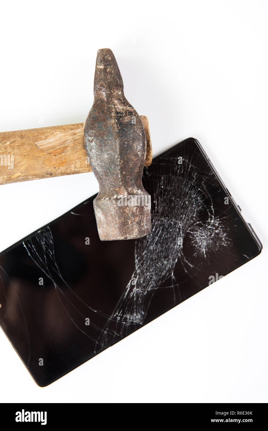 Old broken mobile phone hammer hi-res stock photography and images - Alamy