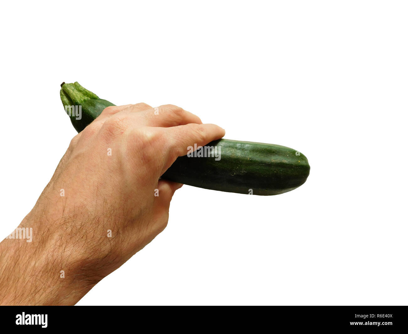 zucchini in hand Stock Photo - Alamy