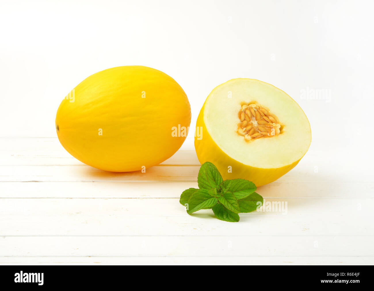 one and half yellow melons Stock Photo - Alamy